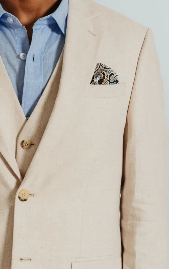 cream linen suit blue shirt
